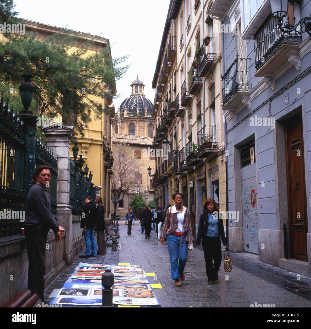 People in the street in the University district of Granada Andalucia ...