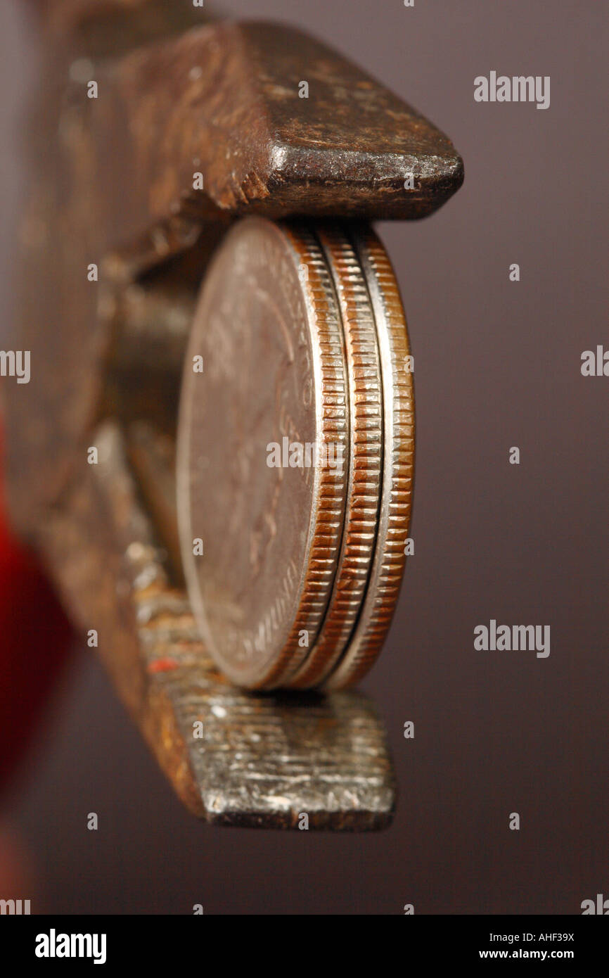 Money squeeze hi-res stock photography and images - Alamy