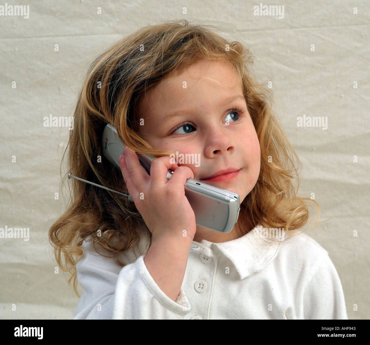 Child Using Cell Phone Stock Photo - Alamy