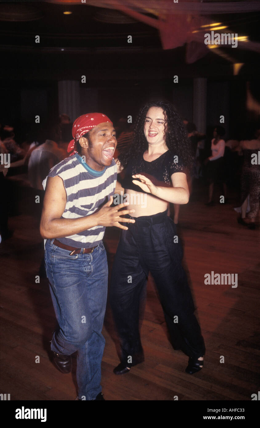 A couple salsa dancing at a night club, Leicester Square, London, UK ...
