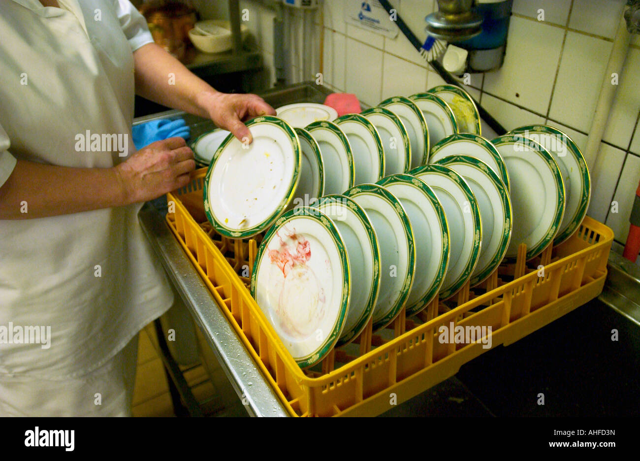 Washing dishes in a restaurant kitchen Stock Photo - Alamy