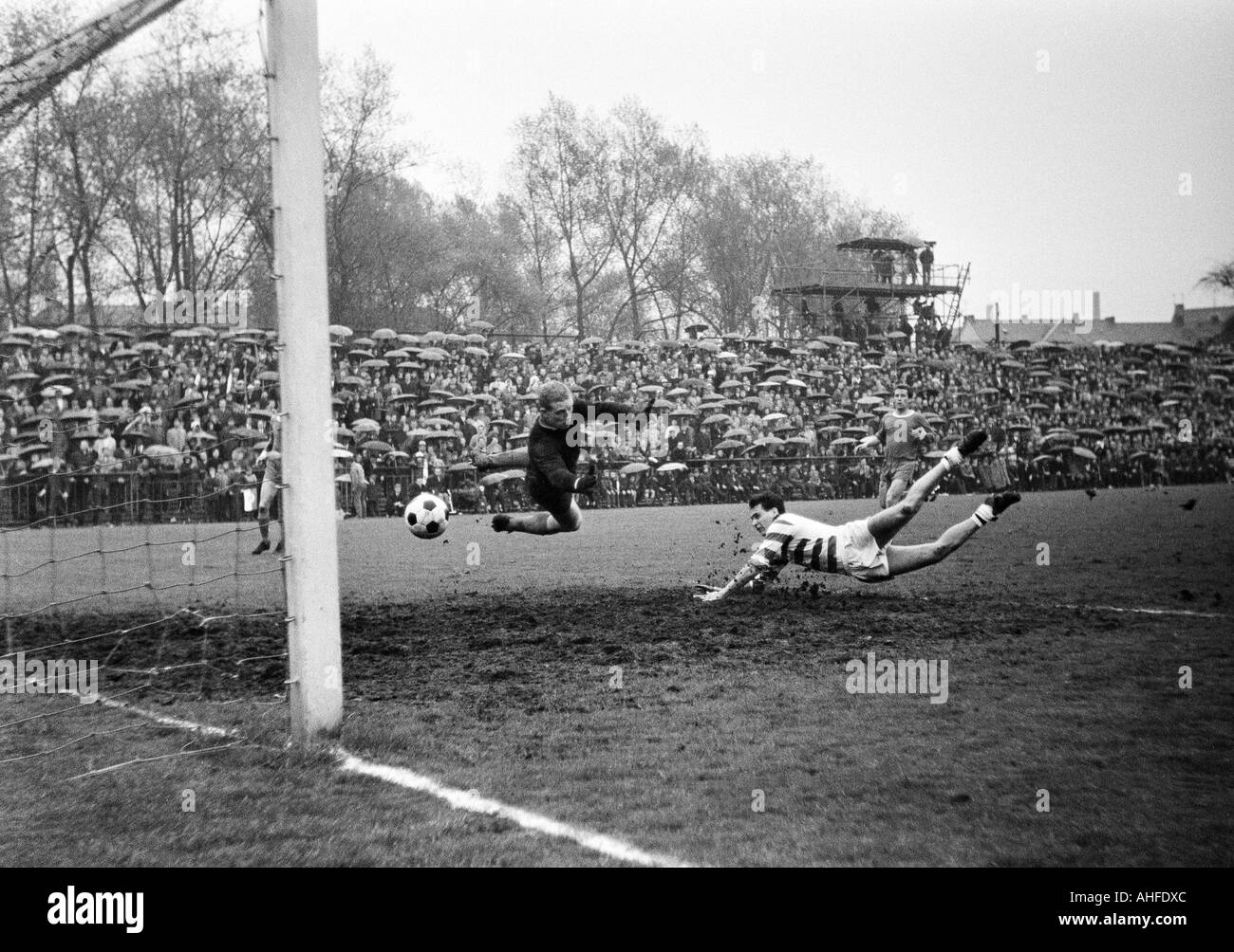 Football stadium player diving header hi-res stock photography and ...