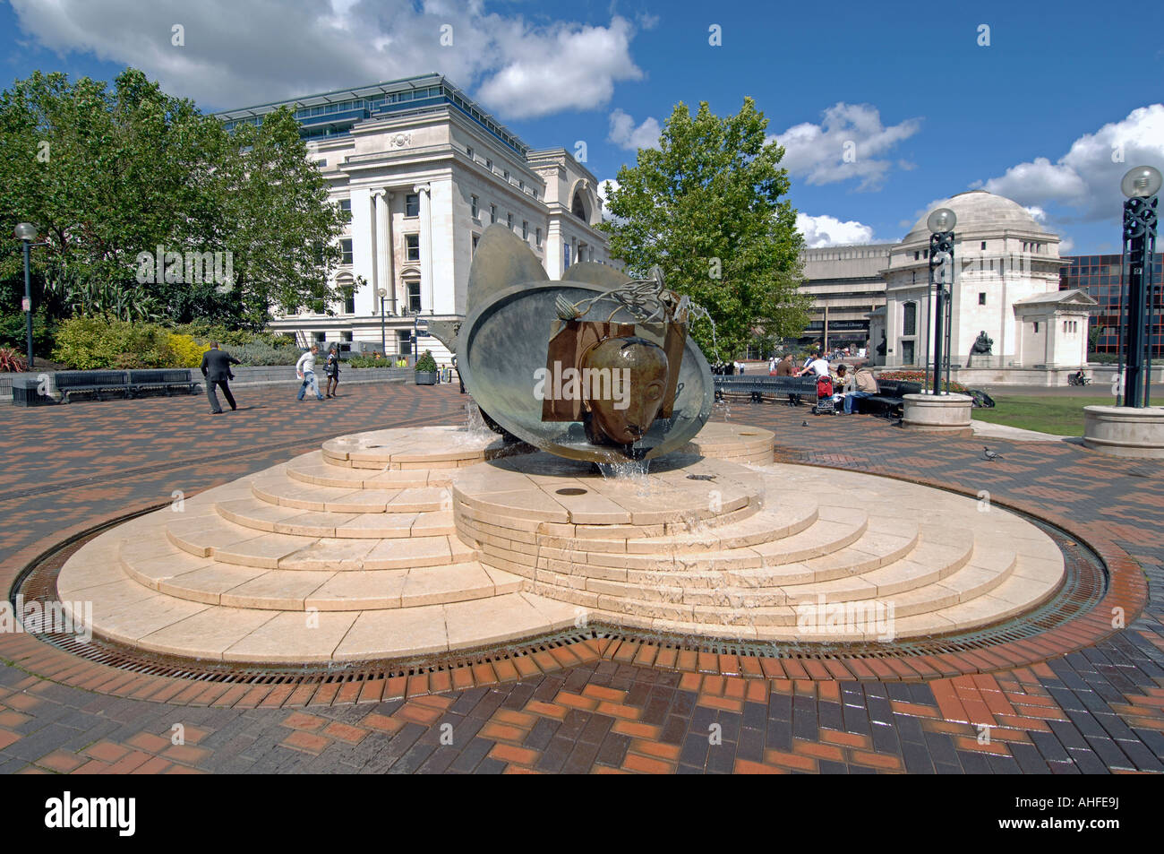 View of the fountain in centenary square, broad st, Birmingham with the Hall of Memory and ...