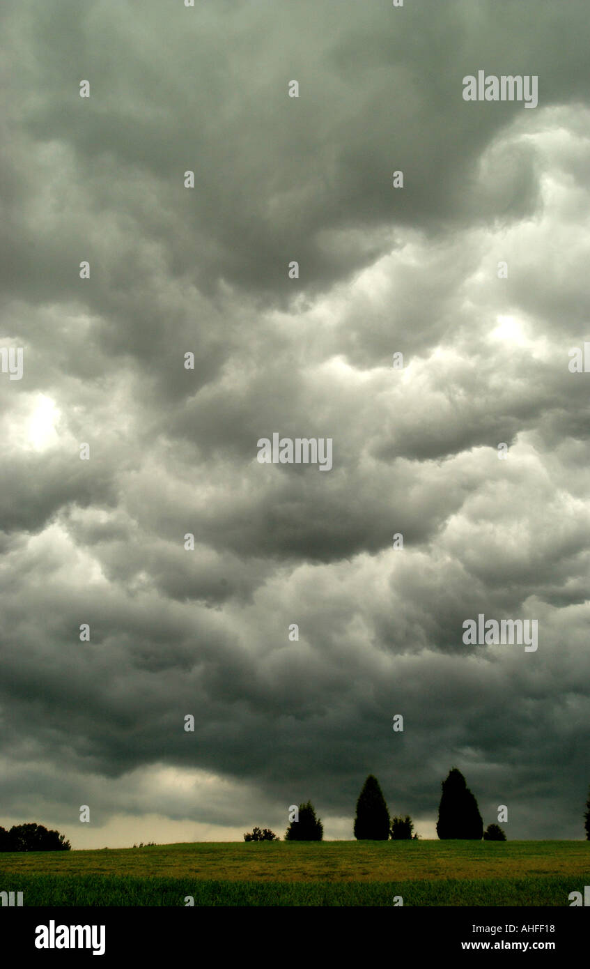 vertical color image of dark clouds ahead of a storm Stock Photo - Alamy
