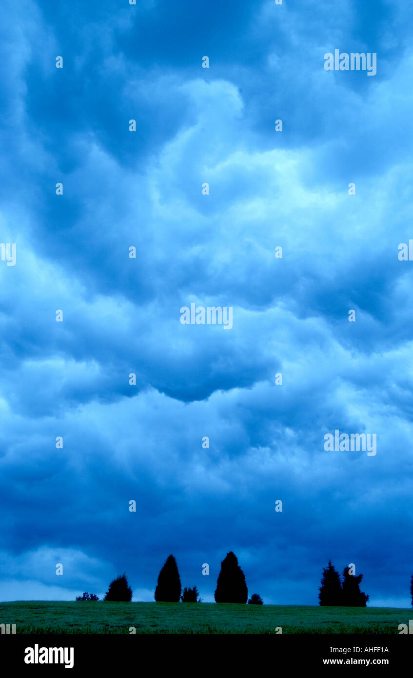 vertical color image of dark clouds ahead of a storm Stock Photo - Alamy