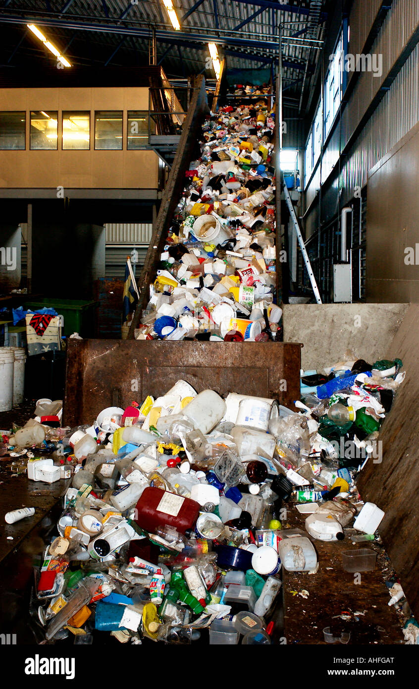 Garbage on a moving conveyor belt Stock Photo - Alamy
