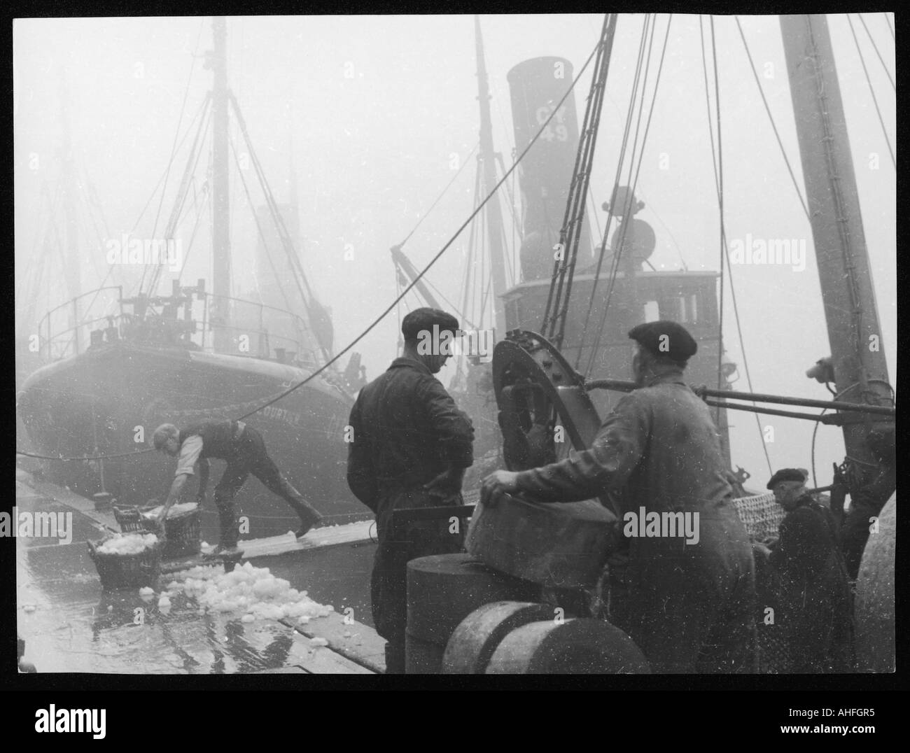 Fishermen at sea shore Black and White Stock Photos & Images - Alamy