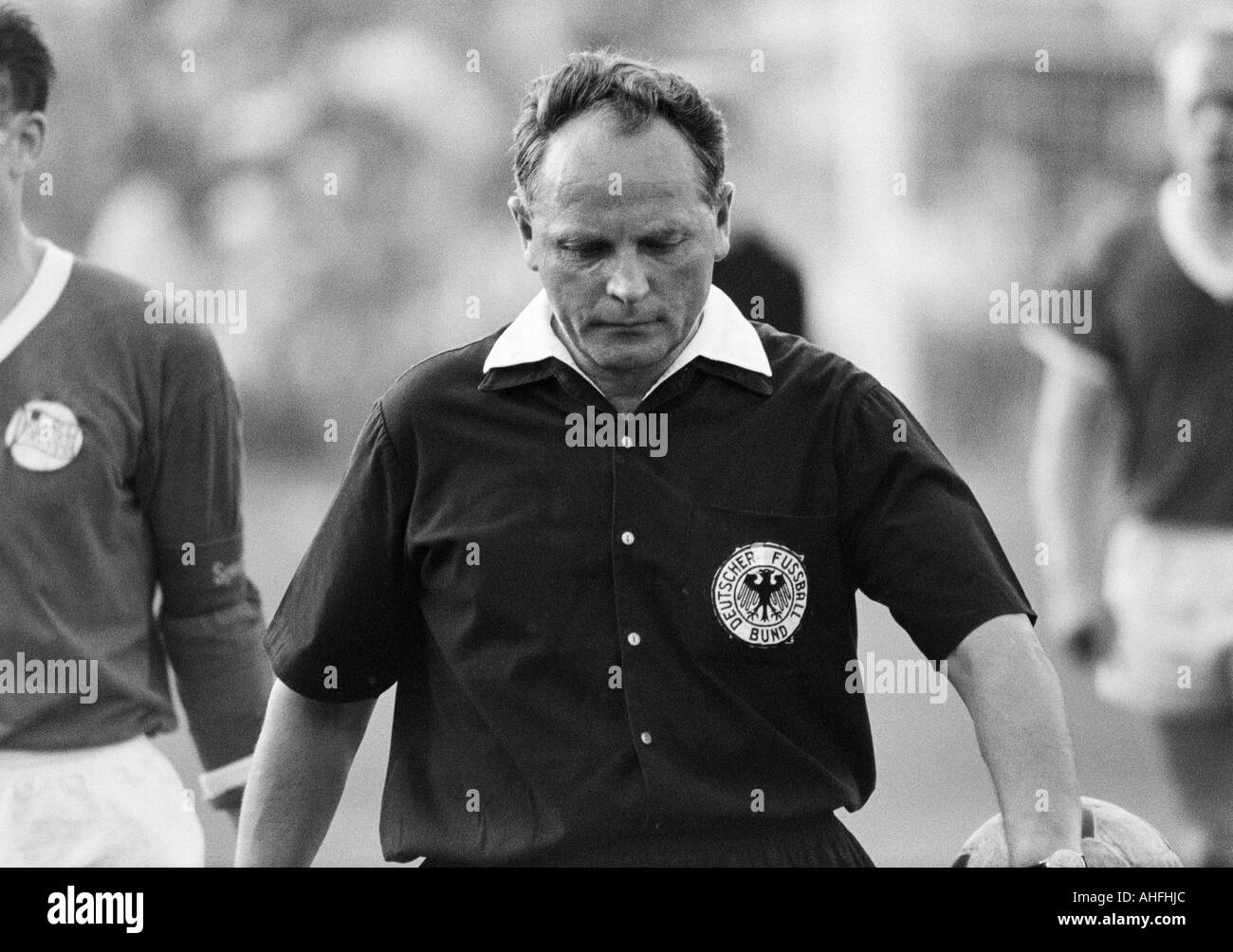 Footballers and referee Black and White Stock Photos & Images - Alamy