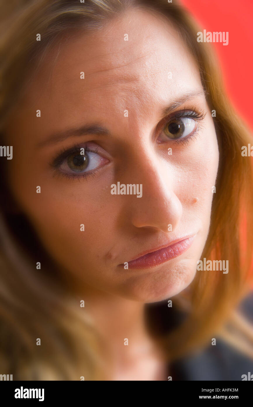 Woman pouting and frowning Stock Photo - Alamy