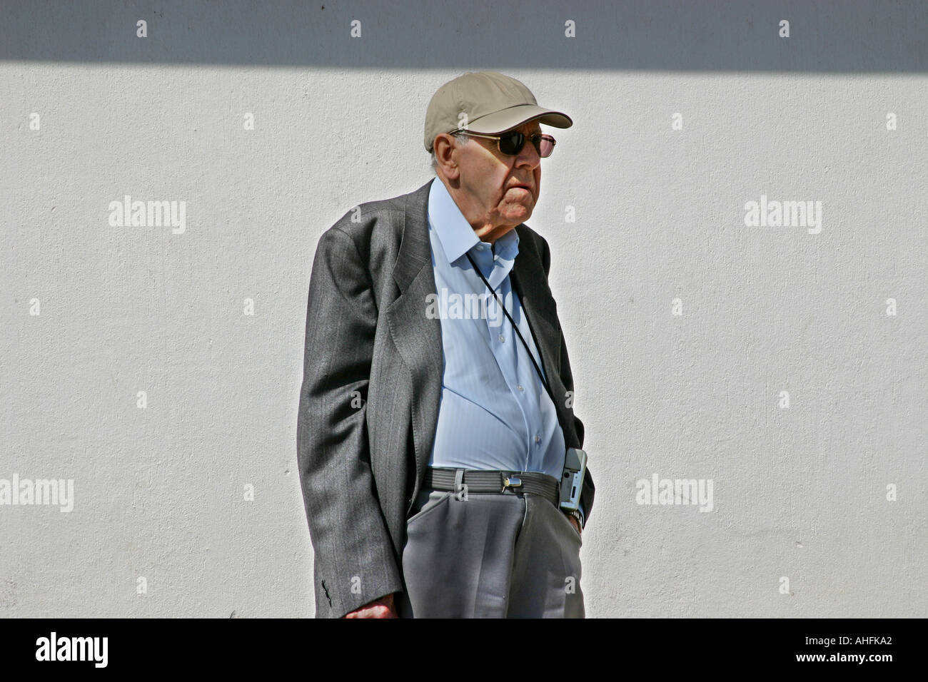 Old man in cap waiting hi-res stock photography and images - Alamy