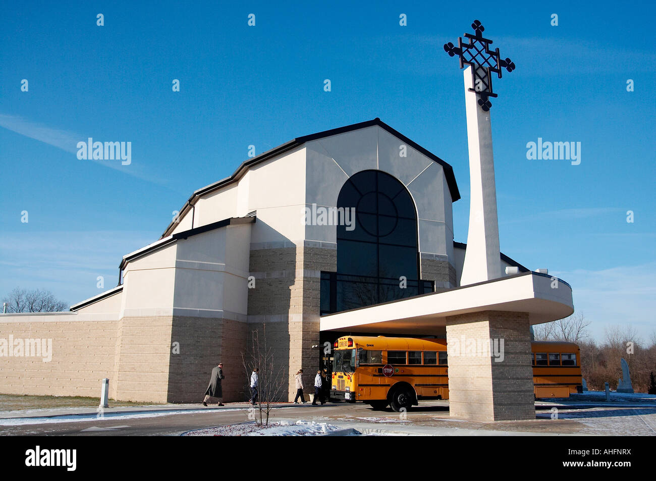 A school bus in front of a Catholic Church Stock Photo - Alamy