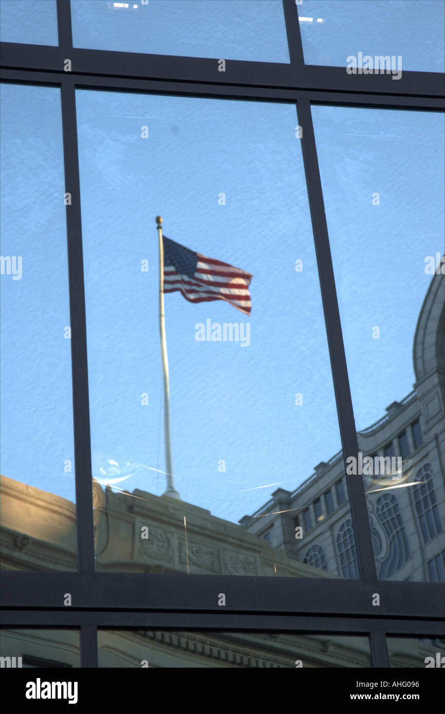 Boston buildings and flag reflected in windows Stock Photo - Alamy