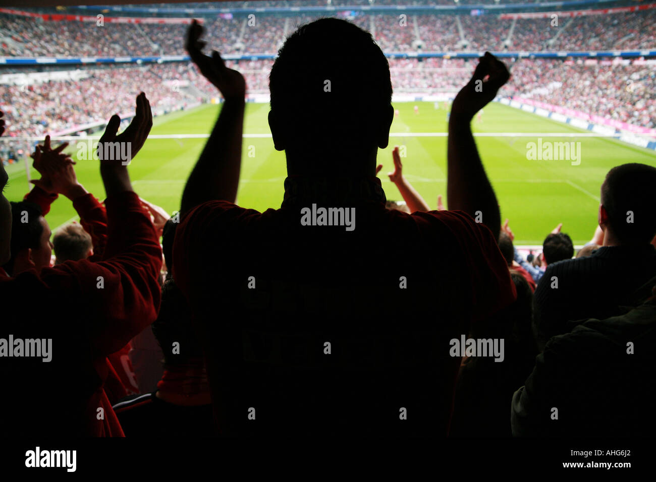 people encouraging their team during a sports game in a stadion Stock ...