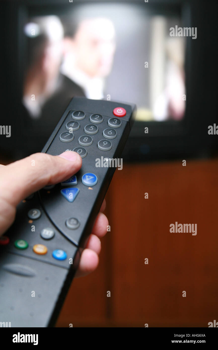 a remote control pointing to a tv Stock Photo - Alamy