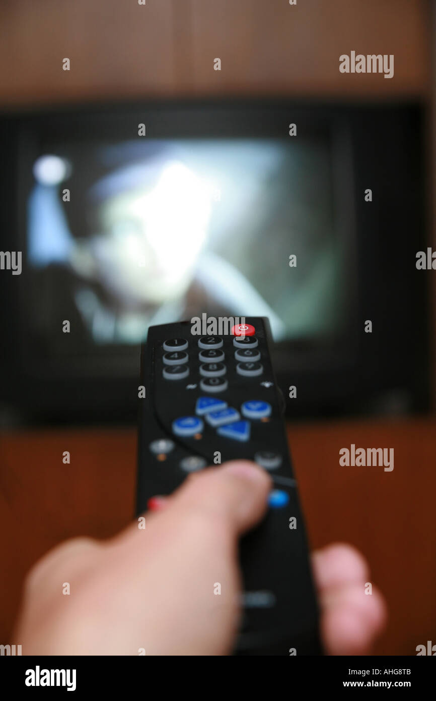 a remote control pointing to a tv Stock Photo - Alamy