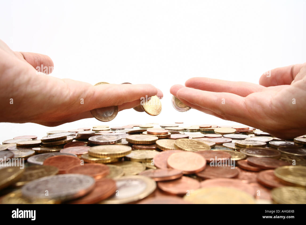 grabbing all the money hands grabbing coins isolated white background ...