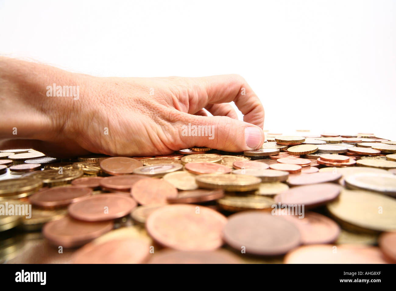 grabbing all the money hands grabbing coins isolated white background ...