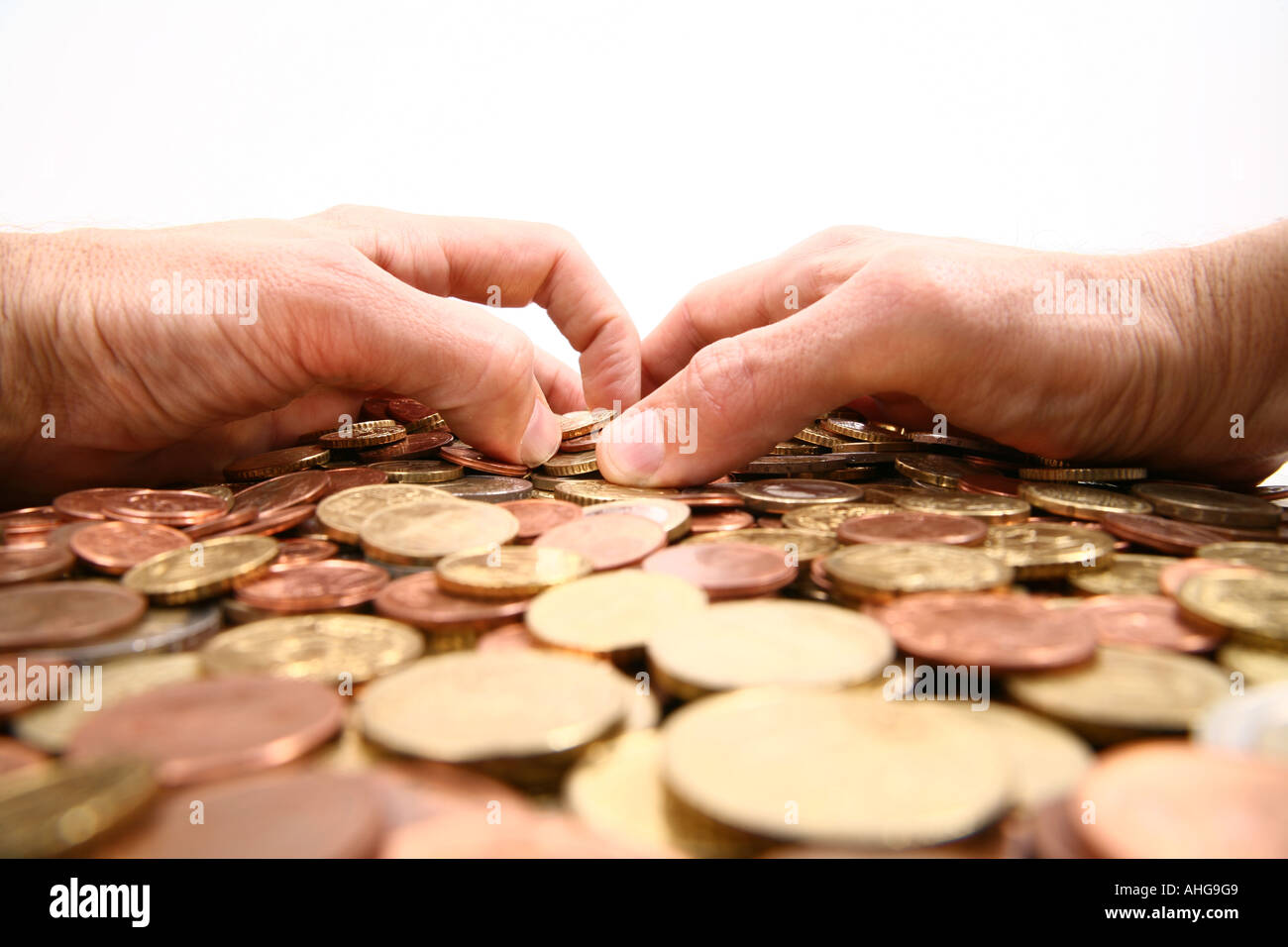grabbing all the money hands grabbing coins isolated white background ...