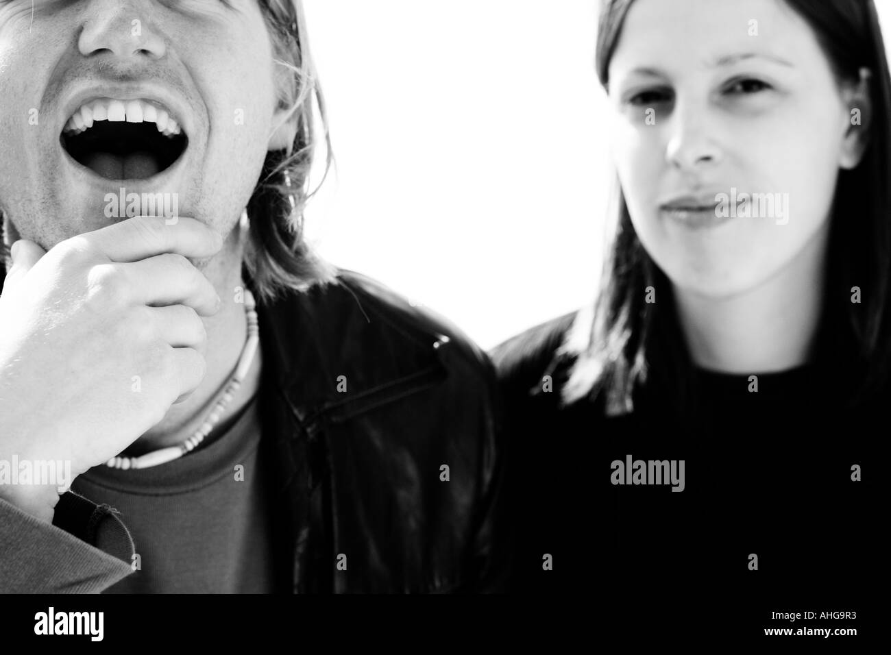 Strong backlighted photo Young couple having fun together Stock Photo ...