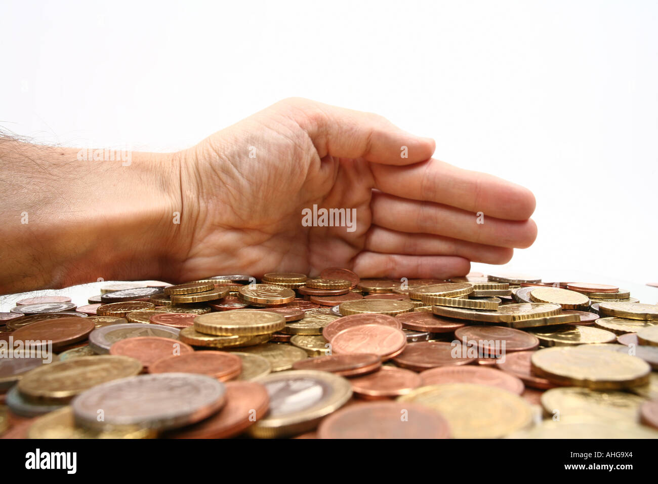 grabbing all the money hands grabbing coins isolated white background ...