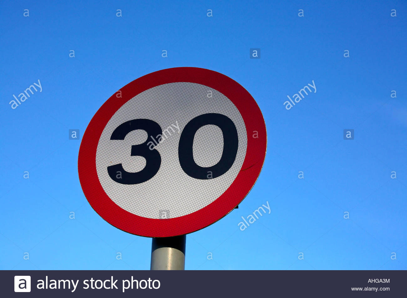30 MPH speed limit signpost Stock Photo - Alamy