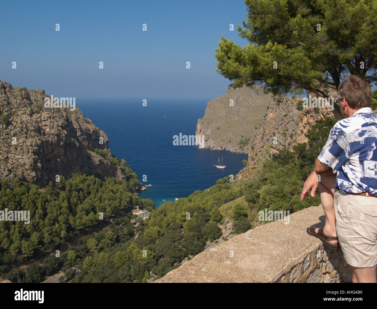 Tourist overlooking Sa Colabra Bay Majorca Spain Stock Photo - Alamy