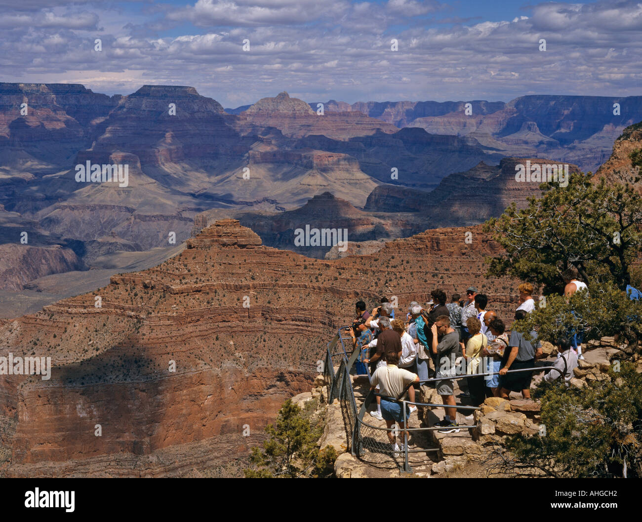Tourists on the viewing platform at Yavapai point, Grand Canyon NP ...