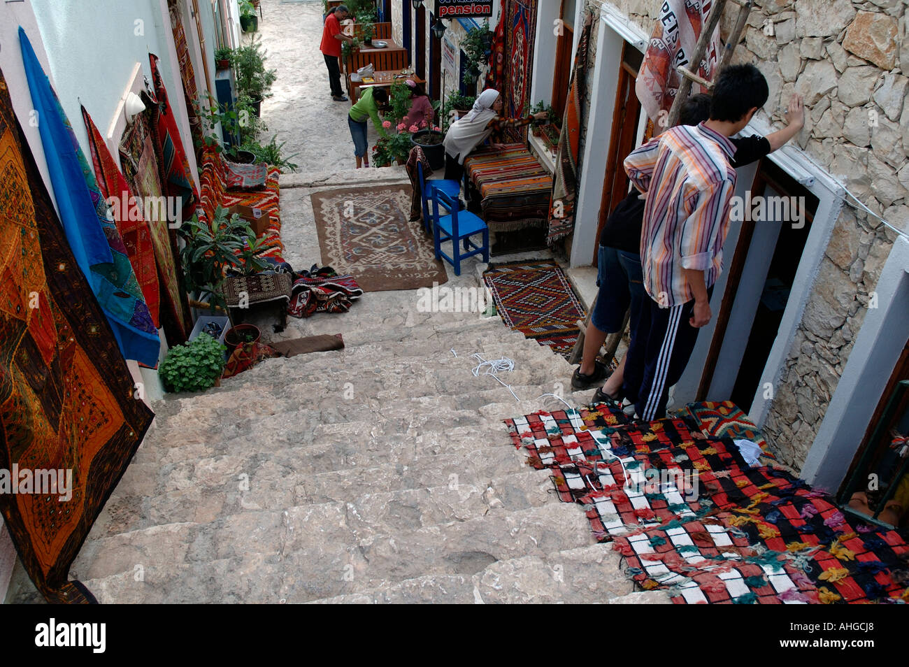 Side street in kalkan selling traditional Turkish rugs and carpets ...