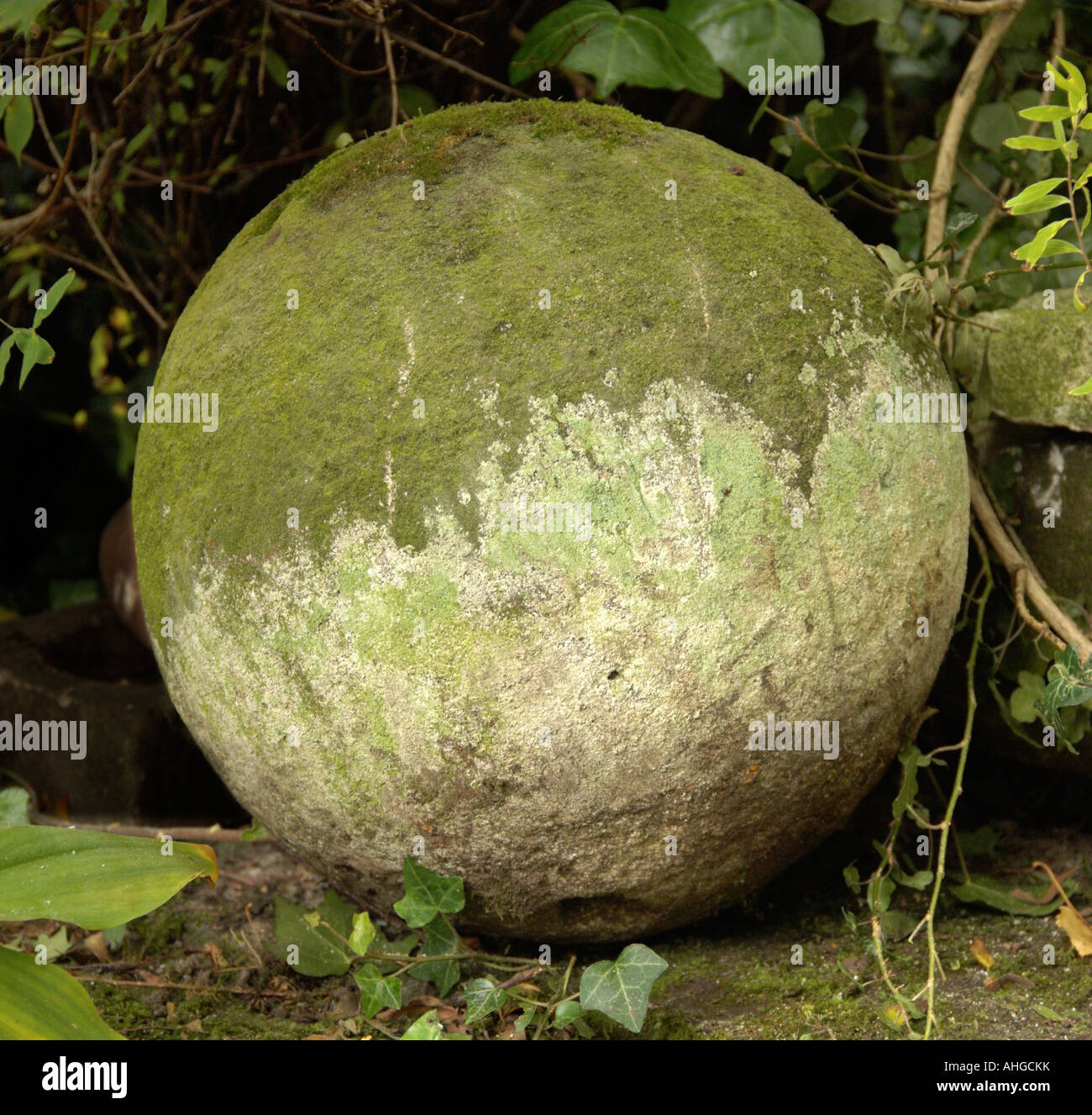 Stone Cannon Ball in an English Garden Stock Photo - Alamy