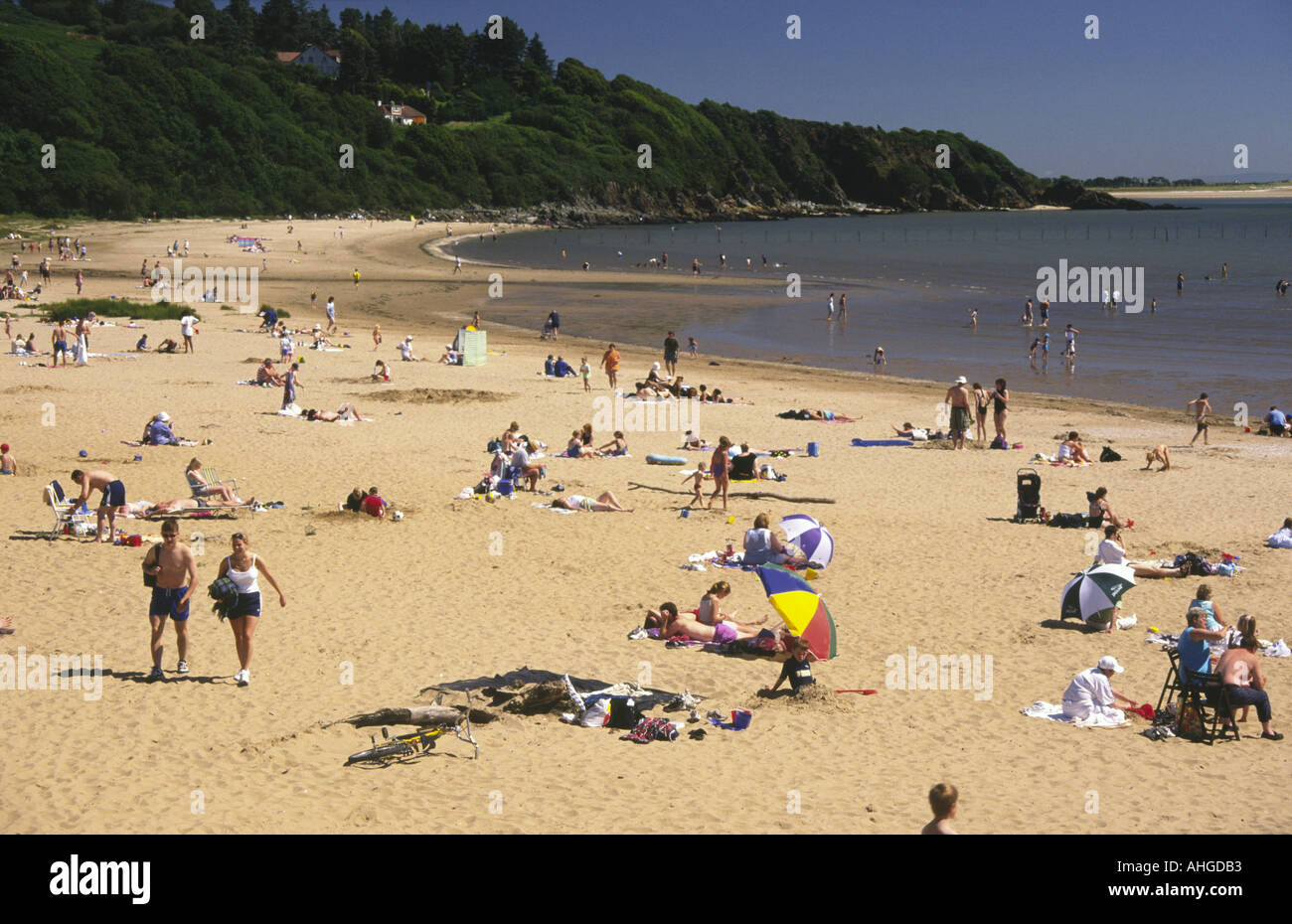 Sun bathers on Sandyhills beach by the Solway Firth Dumfries and ...
