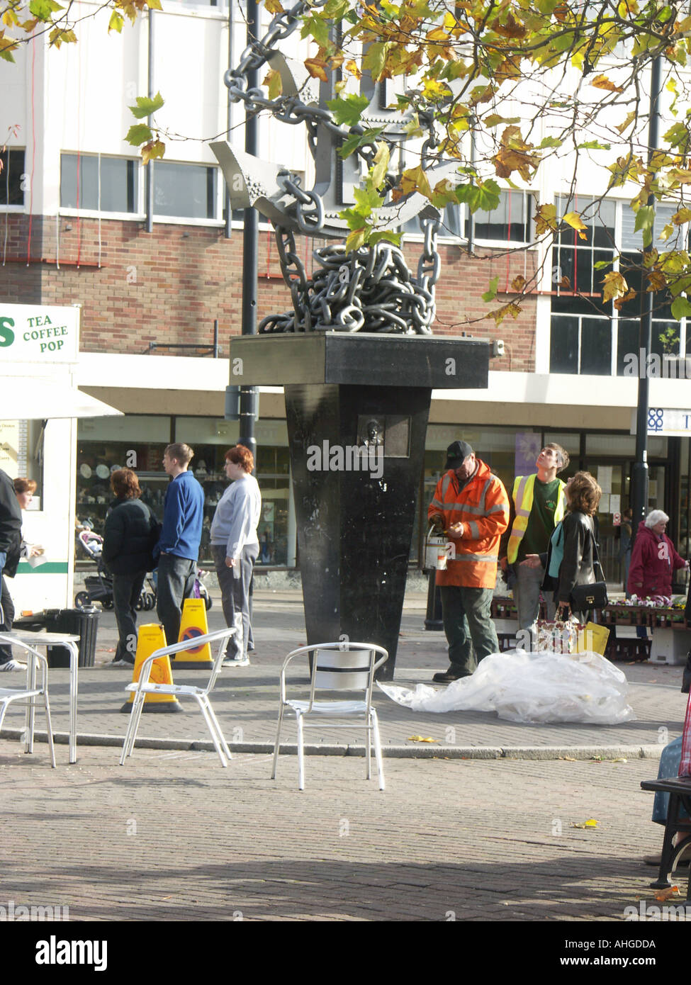 Workmen repairing vandal damage Stock Photo - Alamy