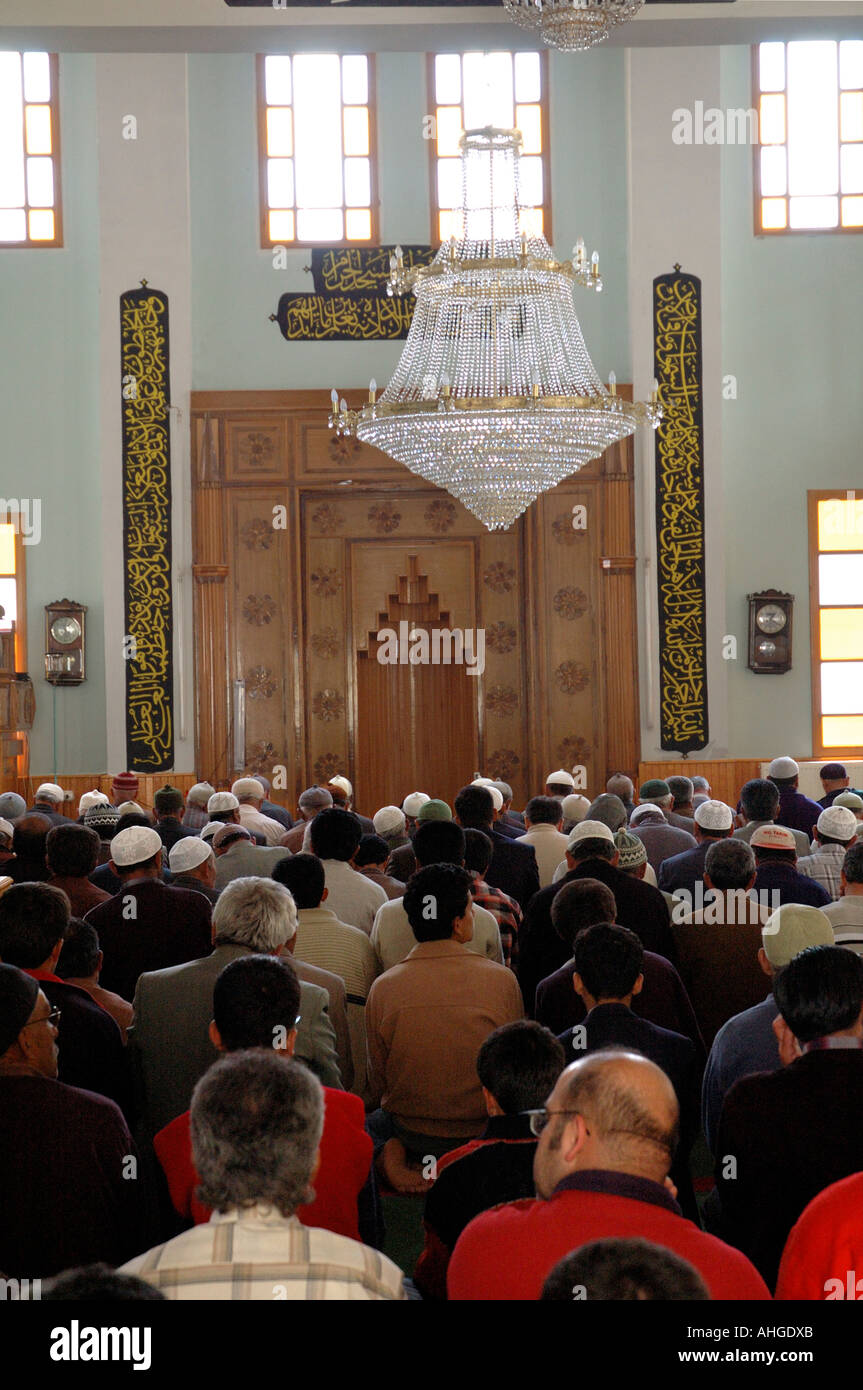 Muslim men praying inside Mosque in village of Gombe in Anatolya ...