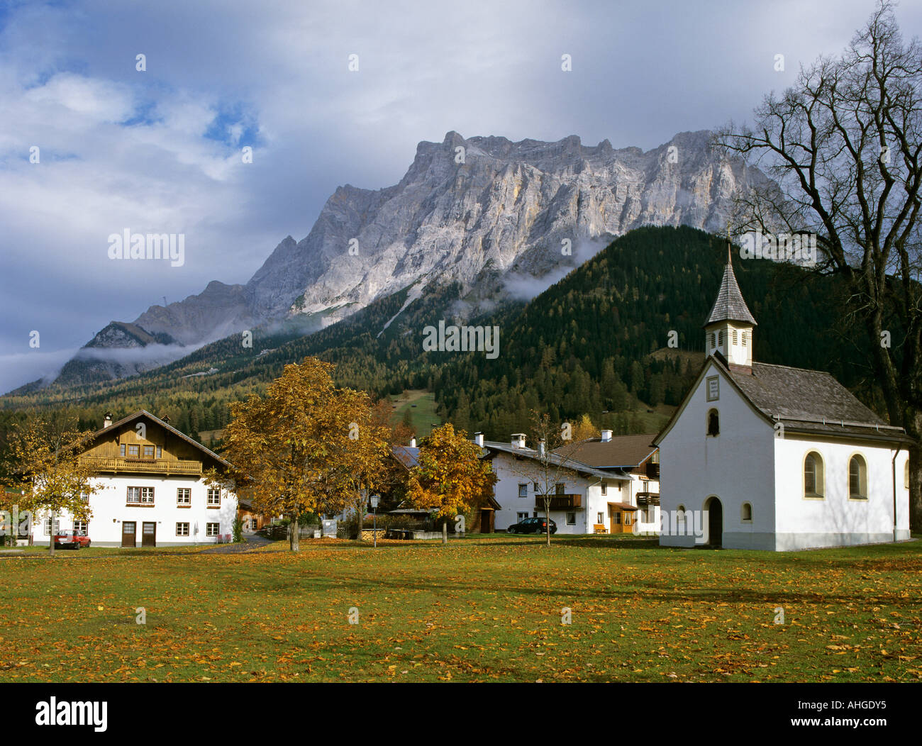 Old farmhouses in front of mountain Zugspitze, Ehrwald , Tyrol, Austria ...