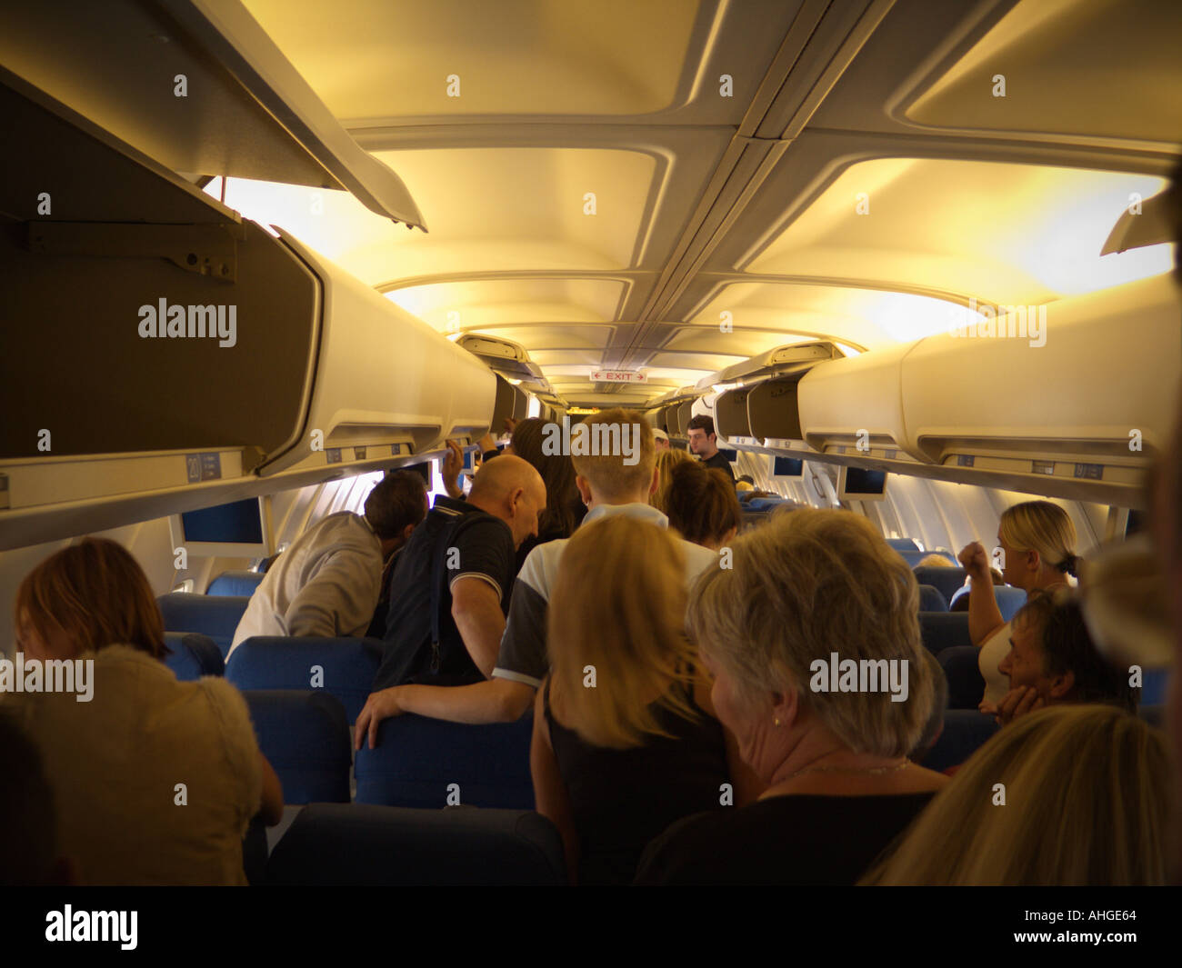Aircraft Interior busy scene full of passengers Stock Photo - Alamy