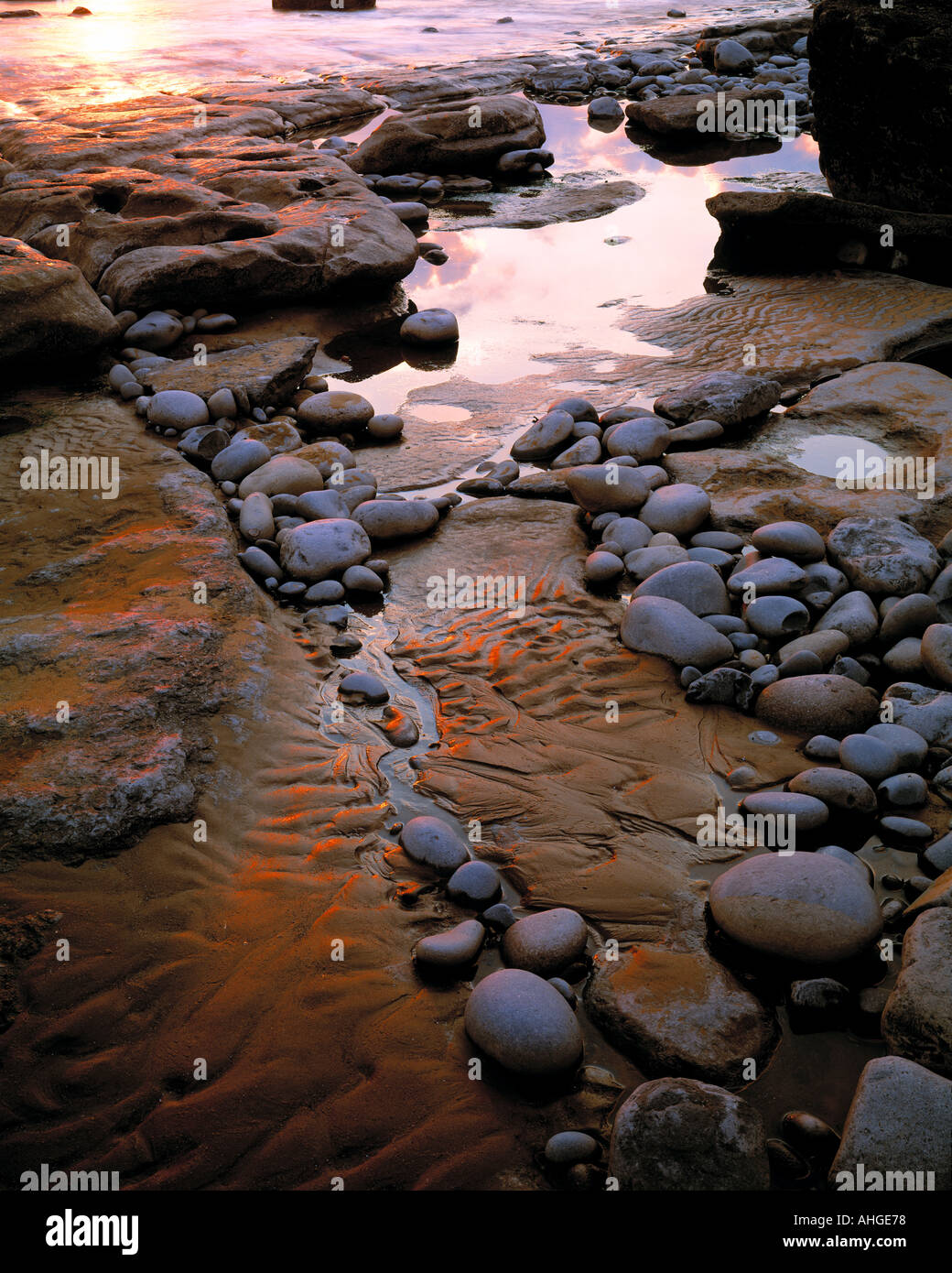 Rock pools at sunset Dunraven bay Stock Photo - Alamy