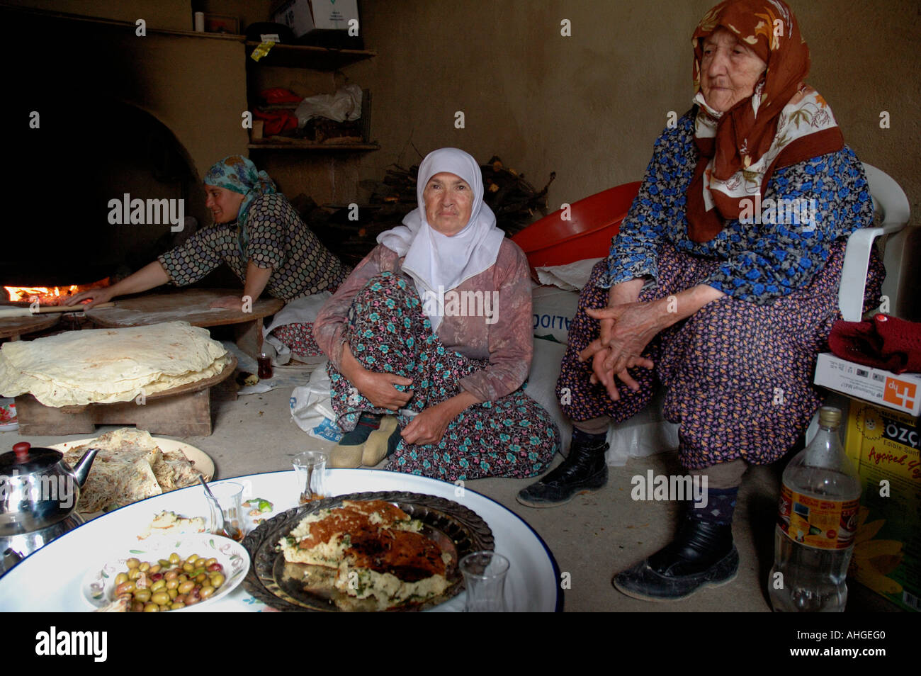 Family of different generations having meal in small rural village of ...