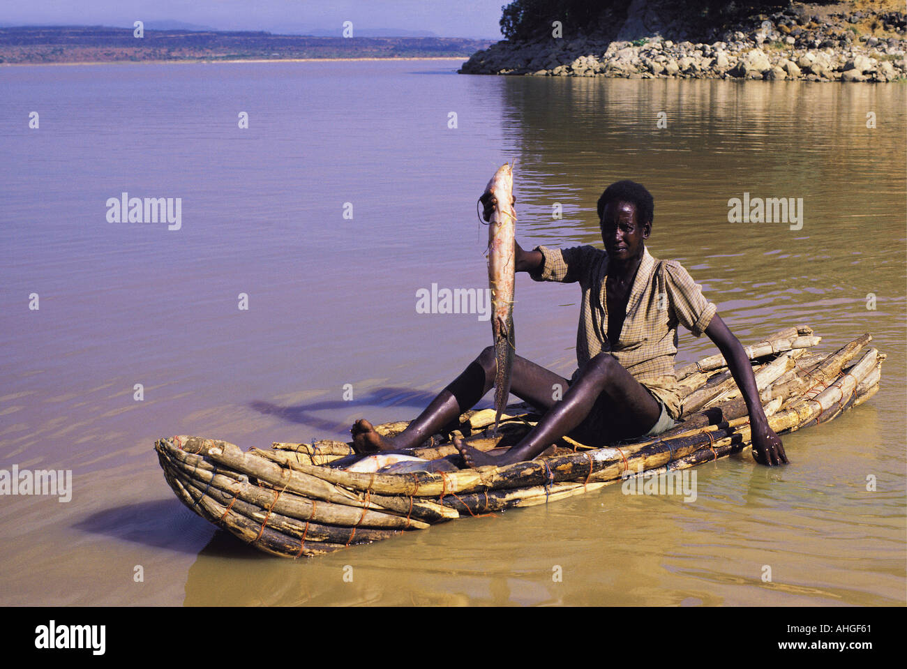 Njemps fisherman riding on his Ambach canoe on Lake Baringo in the ...