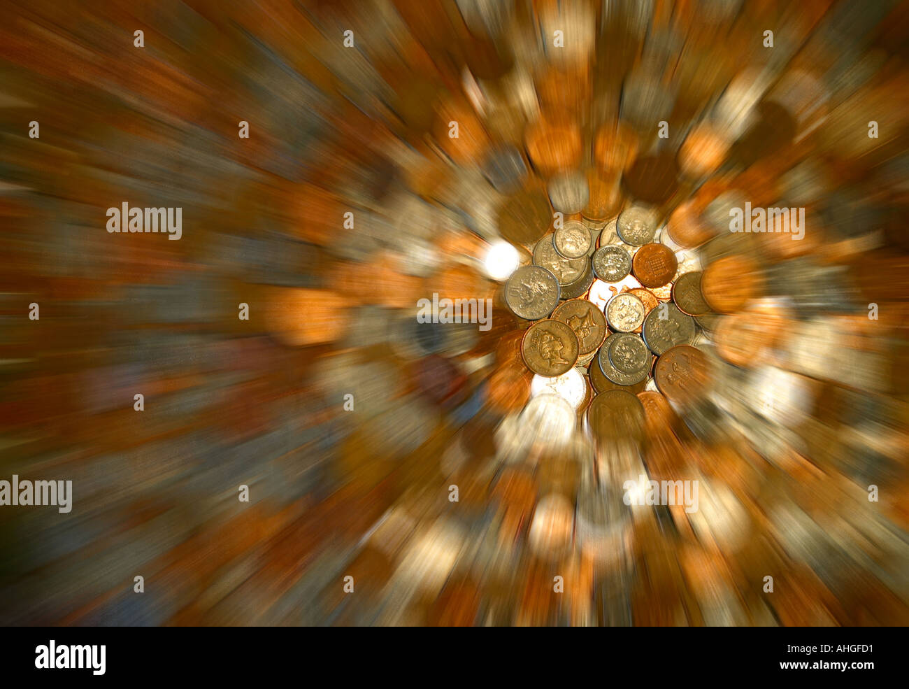 Quantity of UK coins spread out to form background with zoom blur Stock ...
