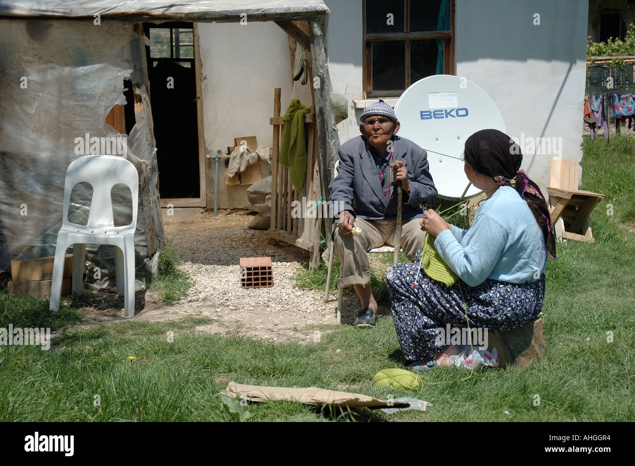 Poor couple sitting in house hi-res stock photography and images - Alamy