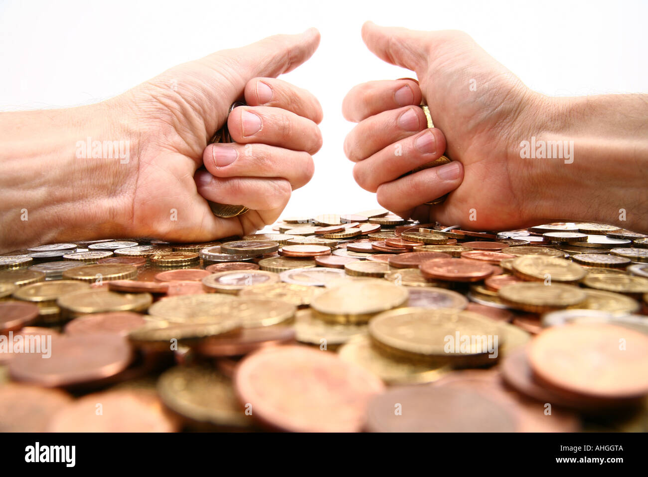 grabbing all the money hands grabbing coins isolated white background ...