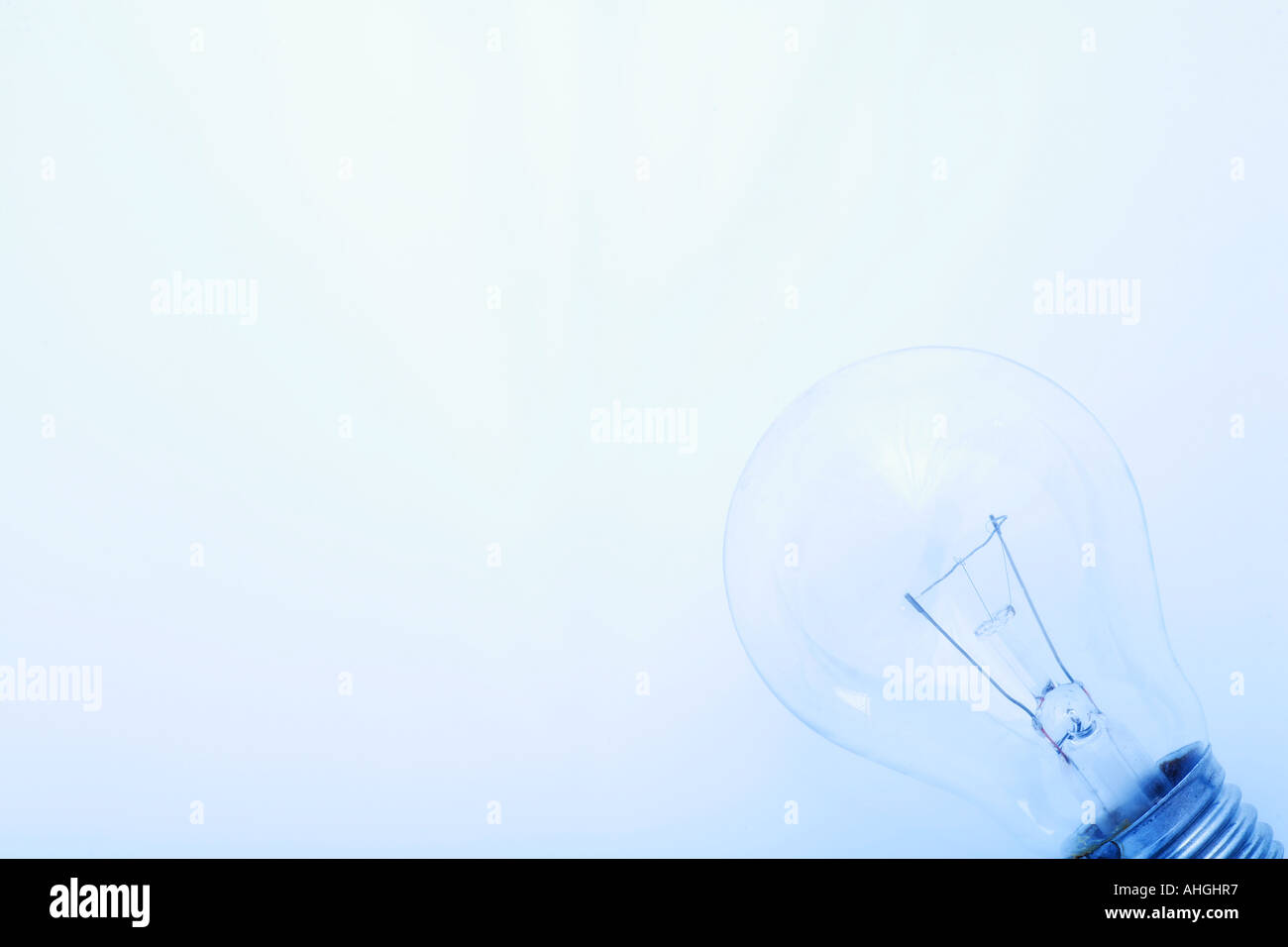 blue idea bulb in bluetone filtered Stock Photo - Alamy
