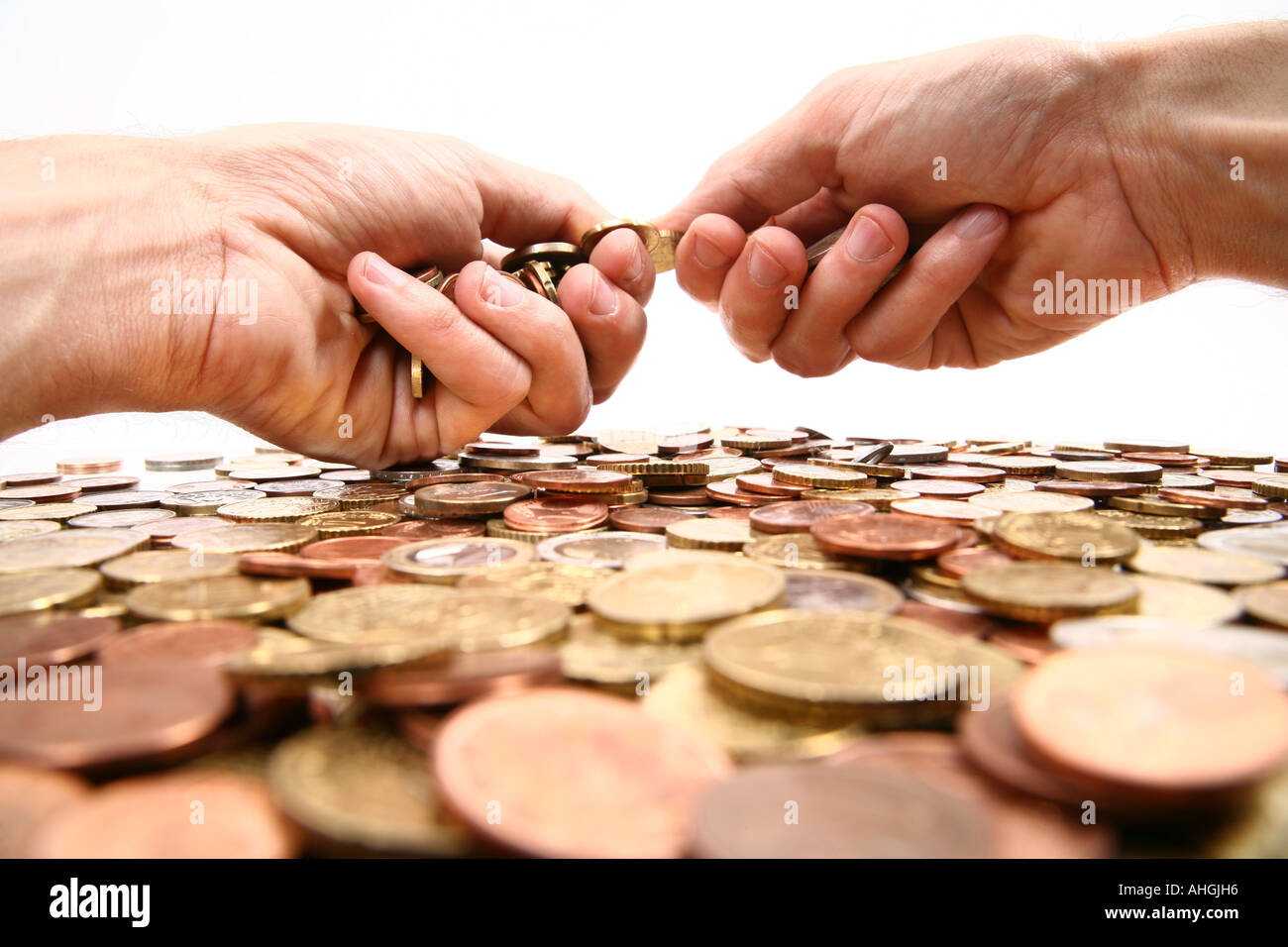 grabbing all the money hands grabbing coins isolated white background ...