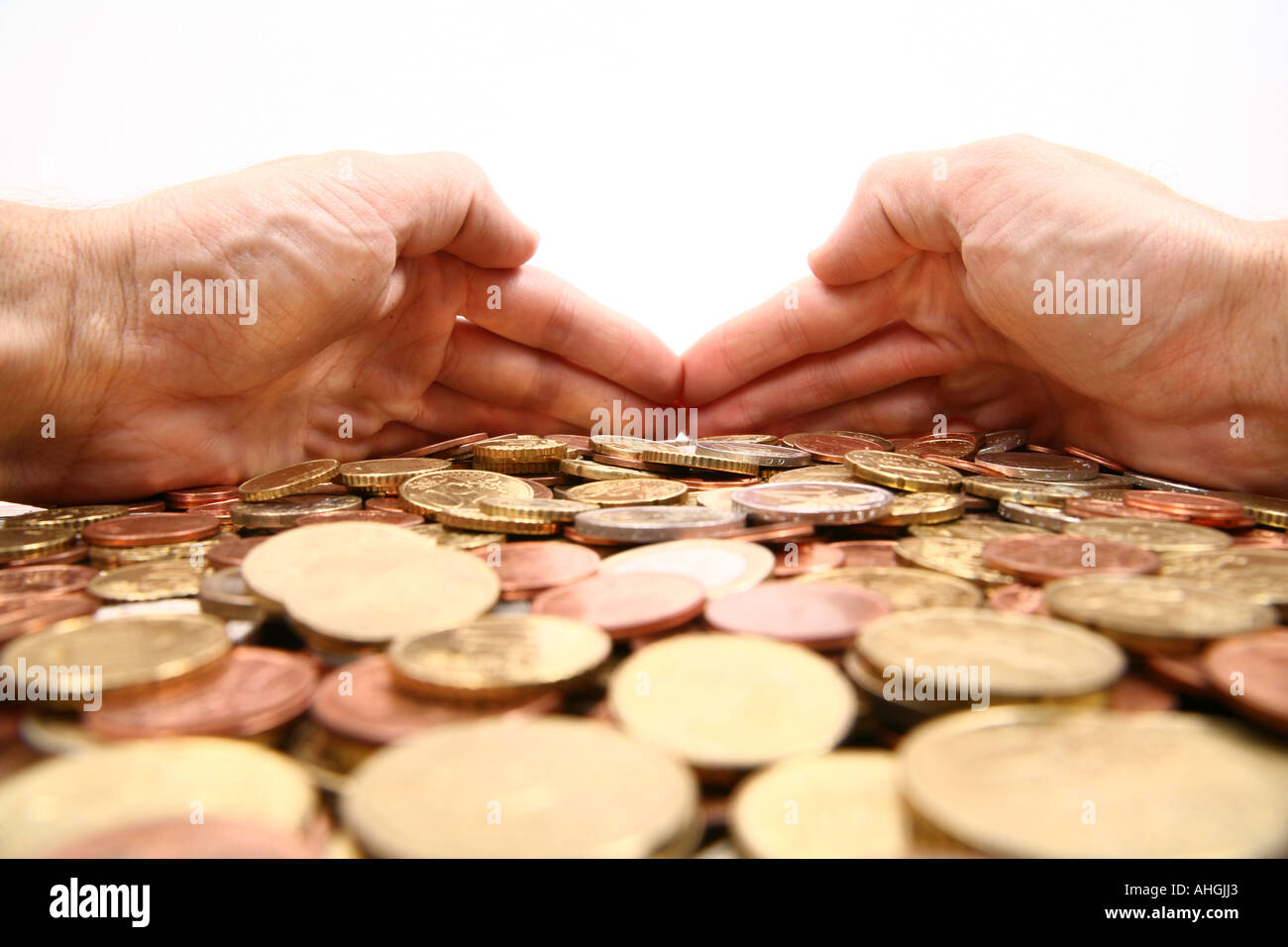 grabbing all the money hands grabbing coins isolated white background ...