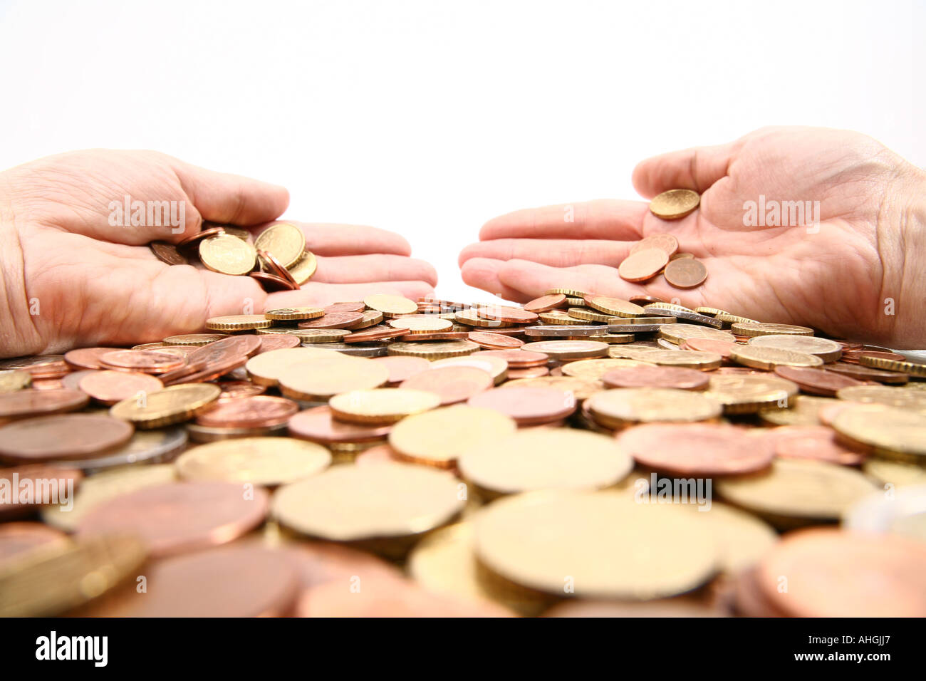 grabbing all the money hands grabbing coins isolated white background ...