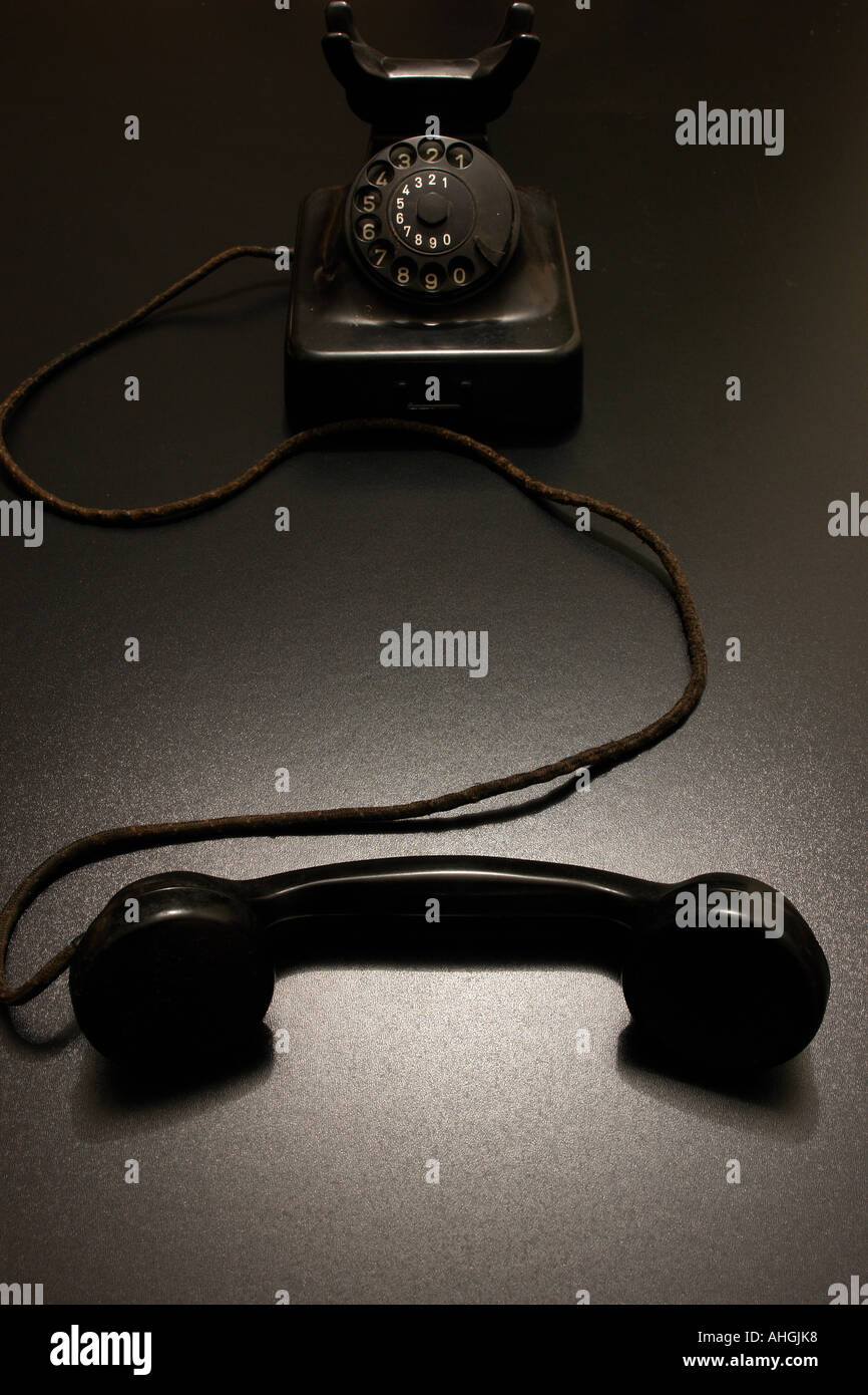 an old vintage telephone in dramatic lighting Stock Photo - Alamy