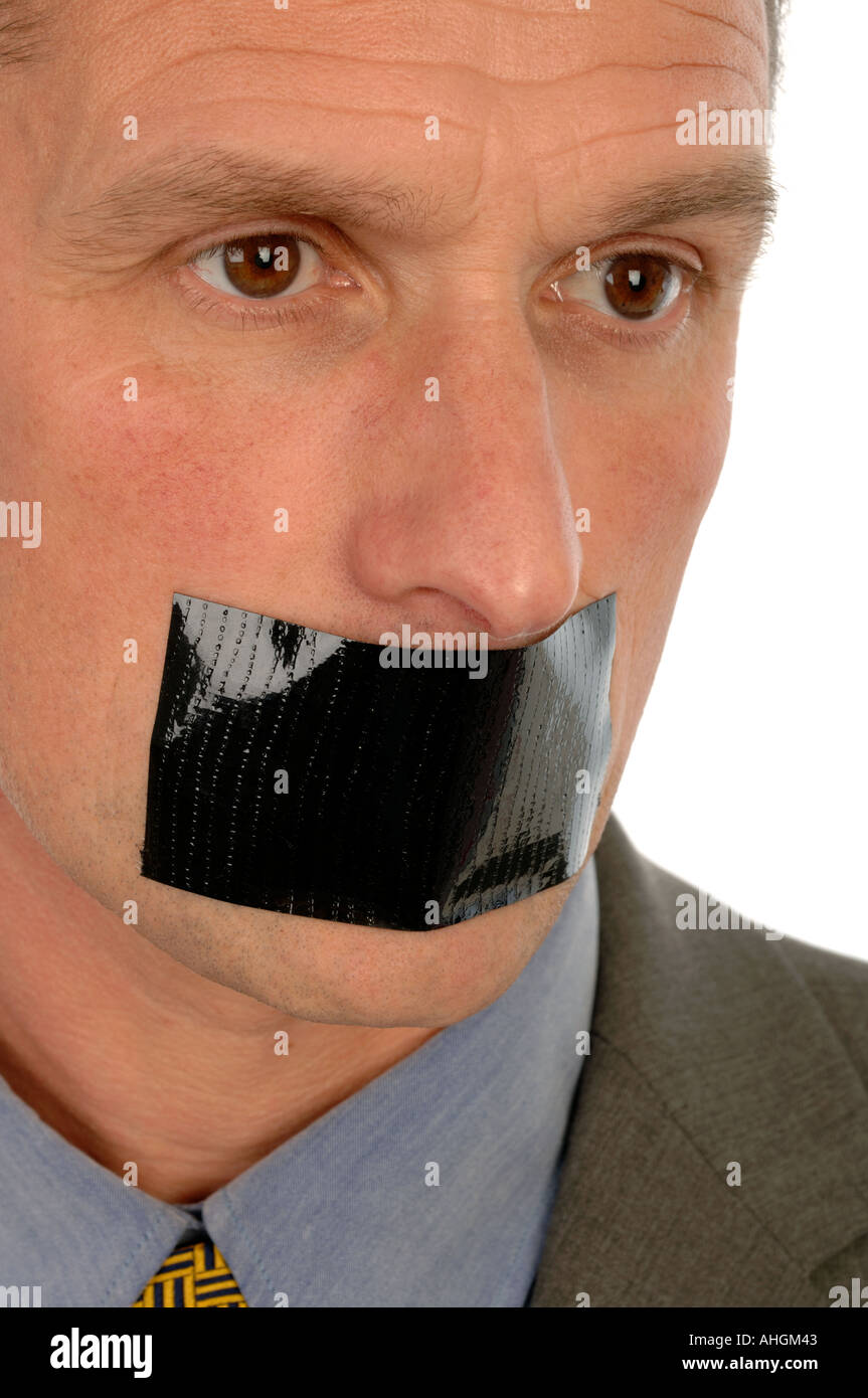 Man with gaffer tape across his mouth Stock Photo - Alamy