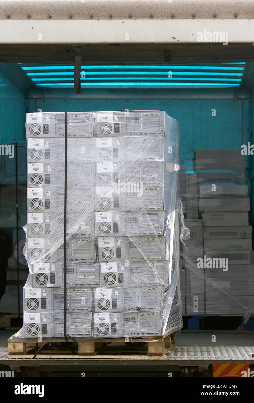 tail lift lorry containing pallet wrapped piles of computer system ...