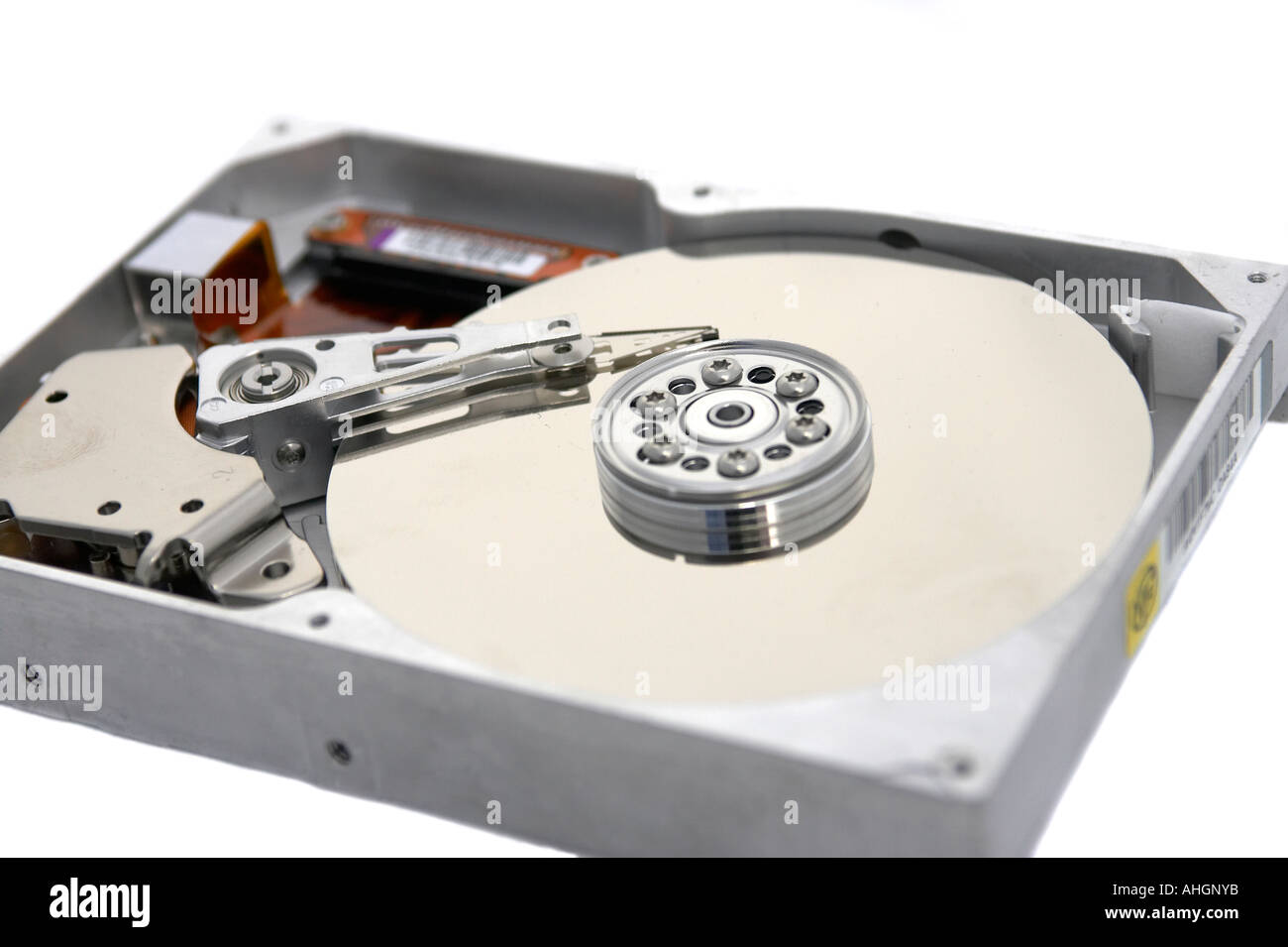 close up of open broken hard drive disk disc against white background ...