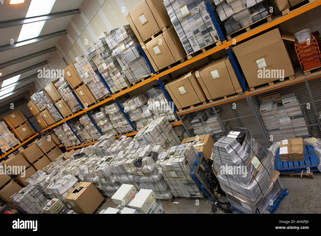Warehouse full of computer parts system boxes monitors to be recycled ...