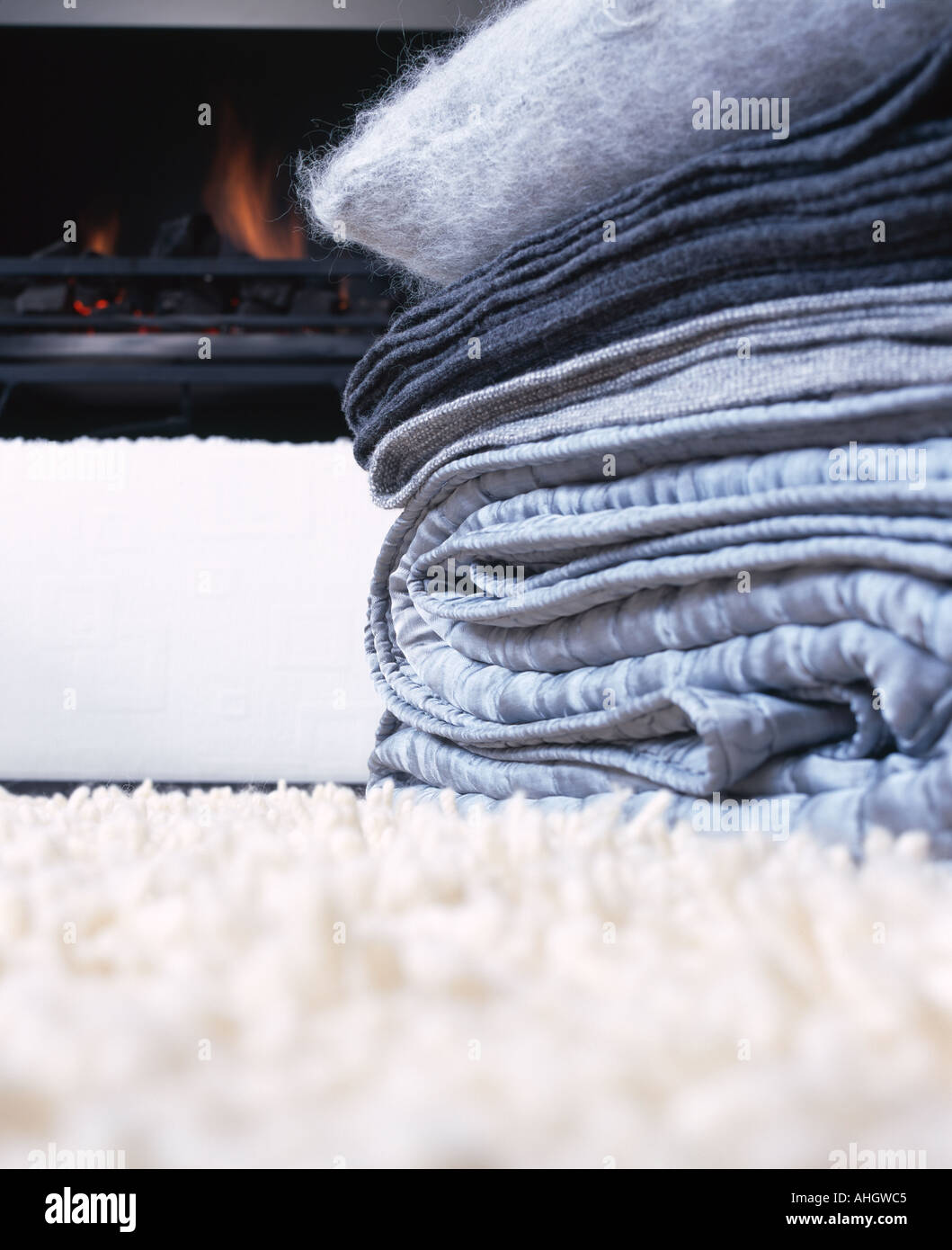 blankets on shag pile rug Stock Photo - Alamy